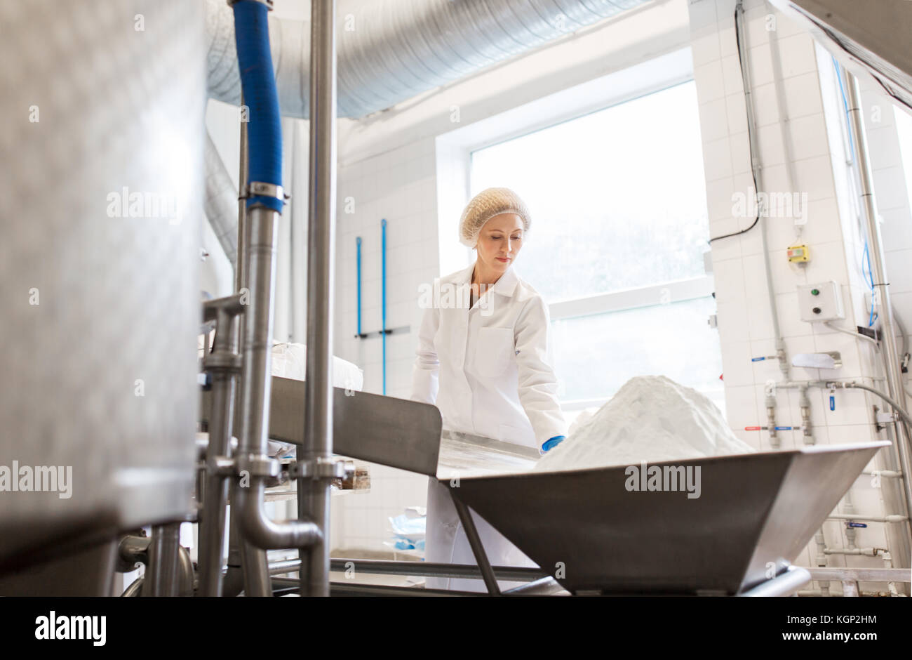 woman working at ice cream factory conveyor Stock Photo - Alamy