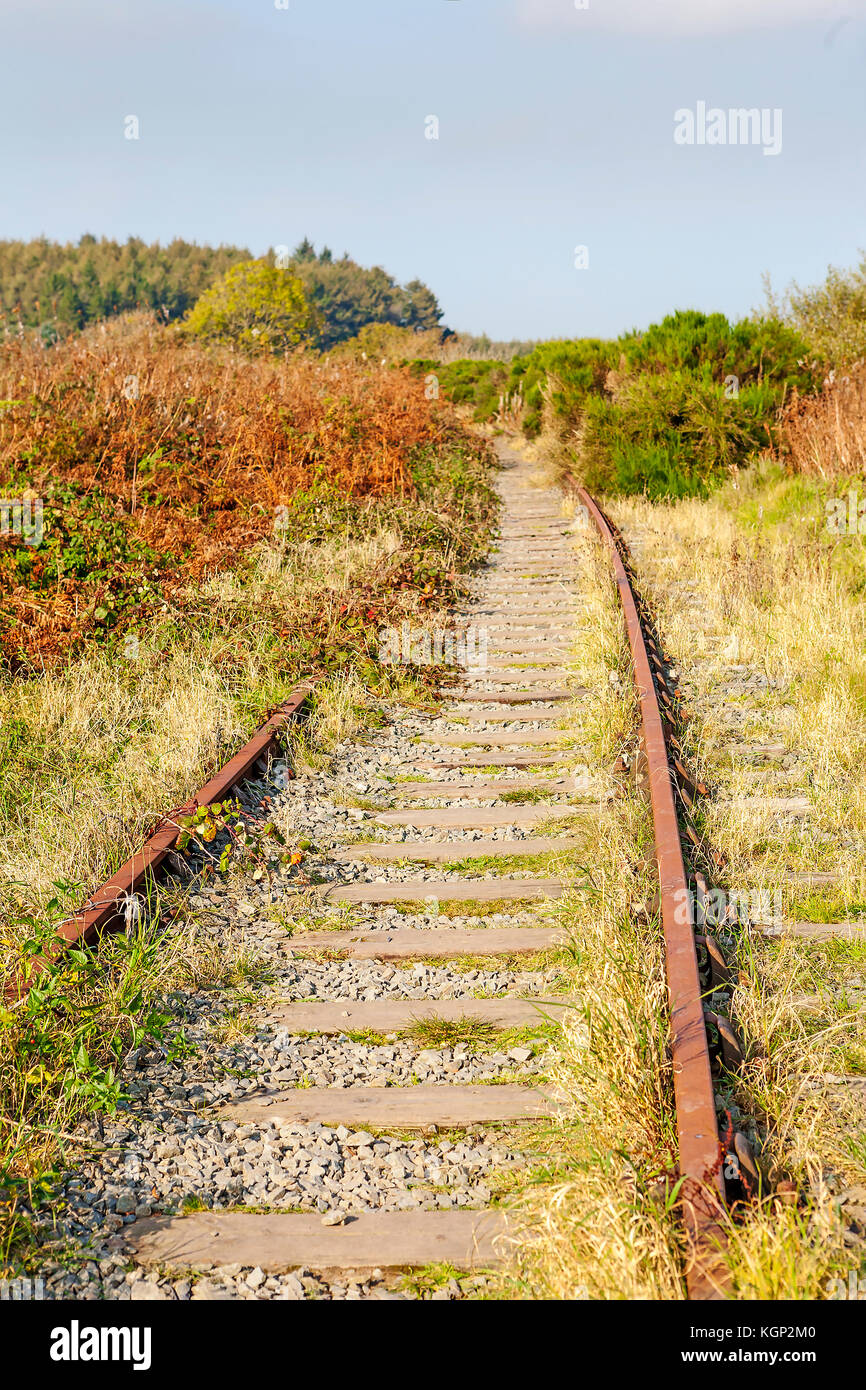 Disused and corroded railway line running into the distance Stock Photo ...