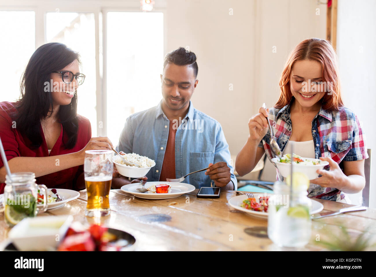 Woman meal friends restaurant indoors hi-res stock photography and ...