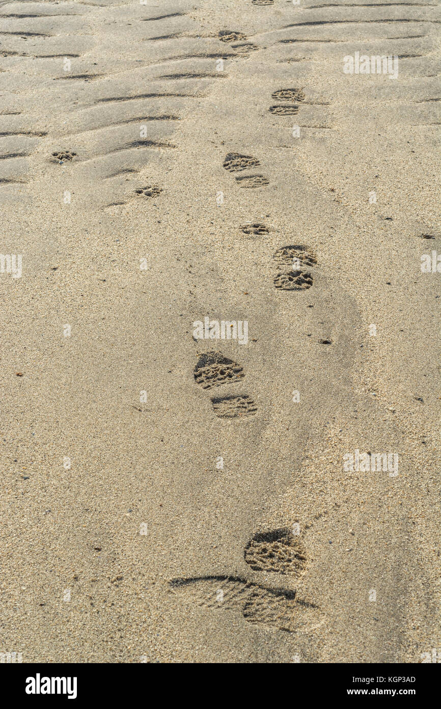 Multiple footprints in sand hi-res stock photography and images - Alamy