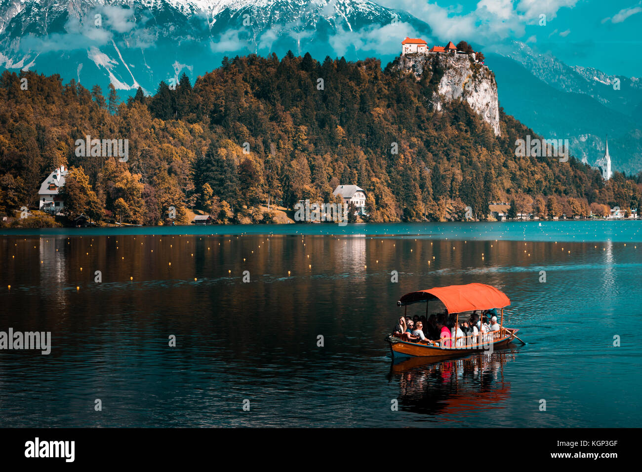 Lake Bled Castle and Boat Stock Photo - Alamy