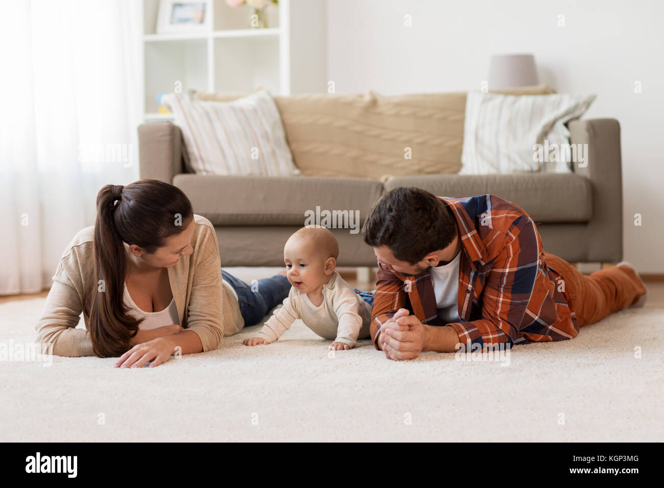 happy family playing with baby at home Stock Photo - Alamy