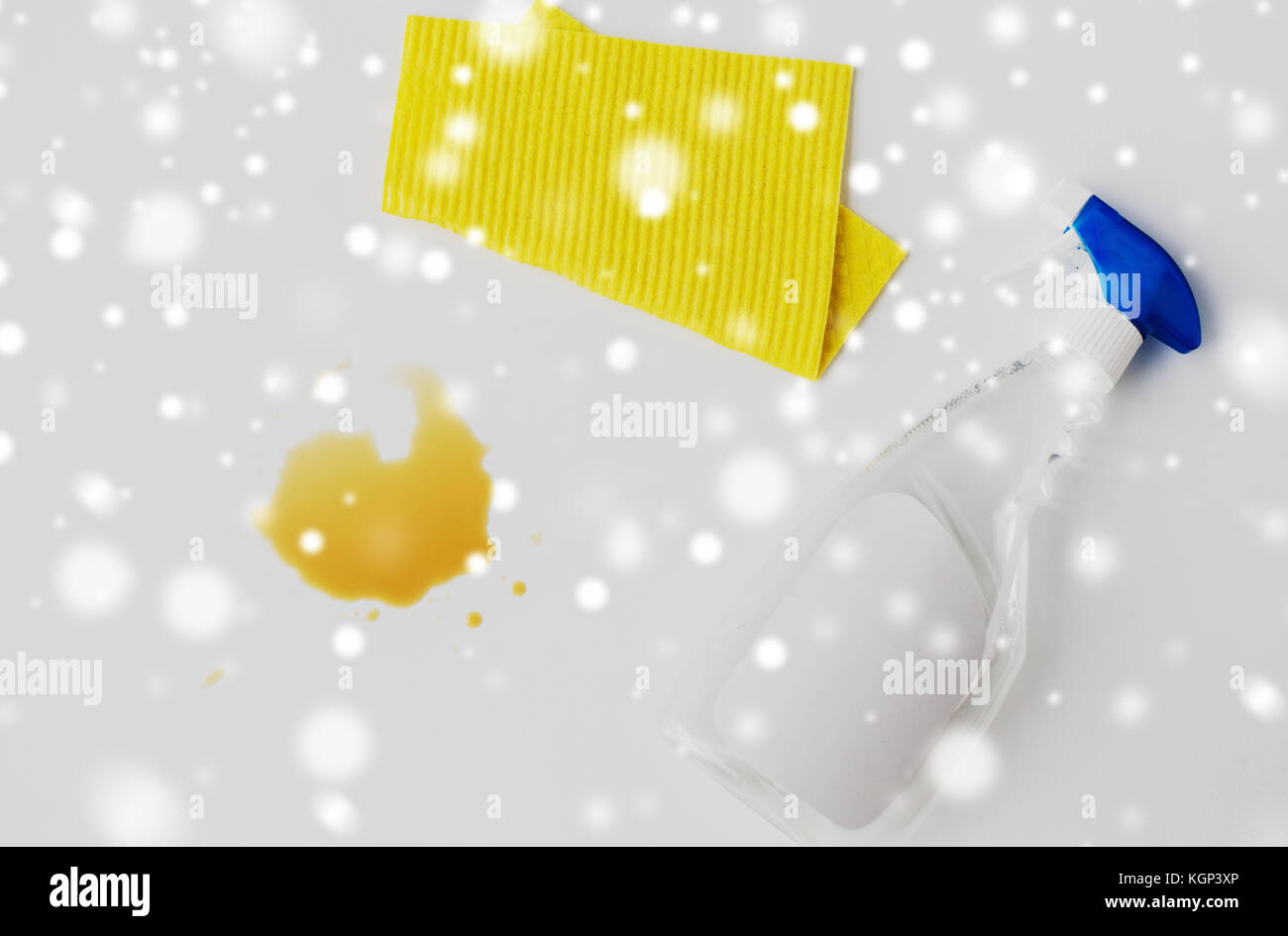cleaning rag, detergent spray and spilled stain Stock Photo - Alamy