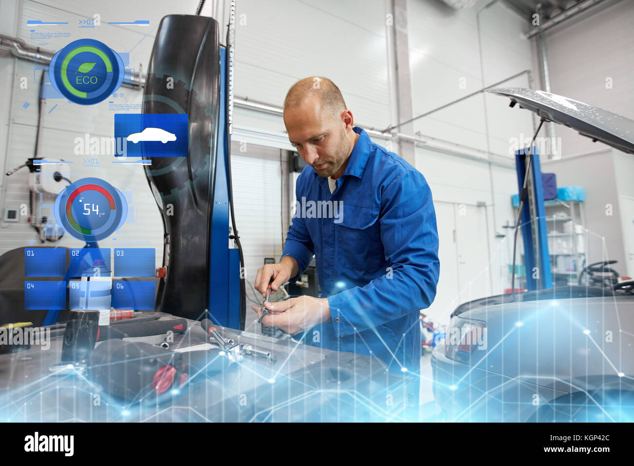 mechanic man with wrench repairing car at workshop Stock Photo - Alamy