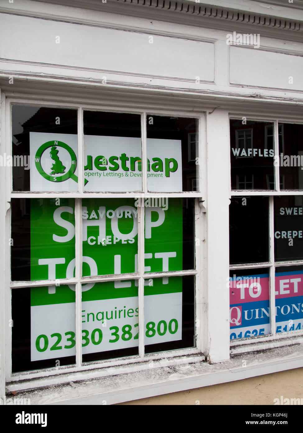 Estate agent shop to let sign in vacant retail property window Stock ...