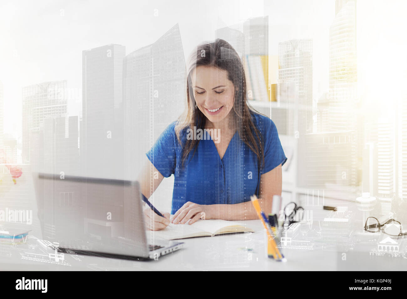 Female office worker taking notes hi-res stock photography and images ...