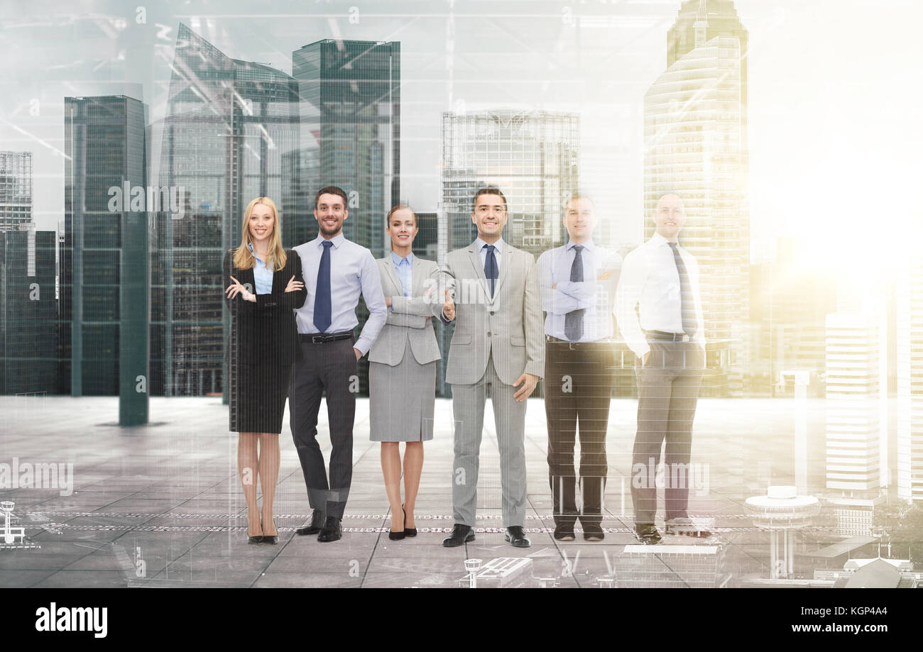 group of smiling businessmen making handshake Stock Photo - Alamy
