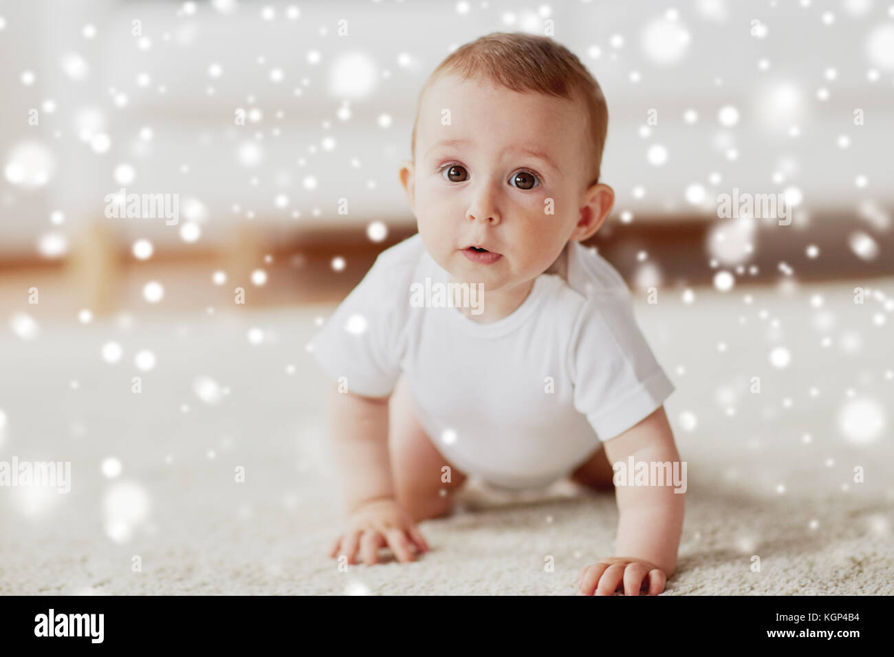 little baby in diaper crawling on floor at home Stock Photo - Alamy