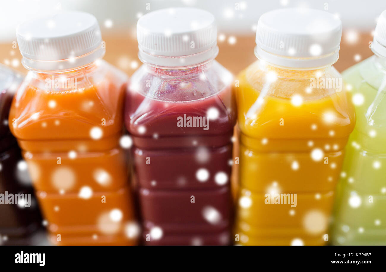 bottles with different fruit or vegetable juices Stock Photo - Alamy
