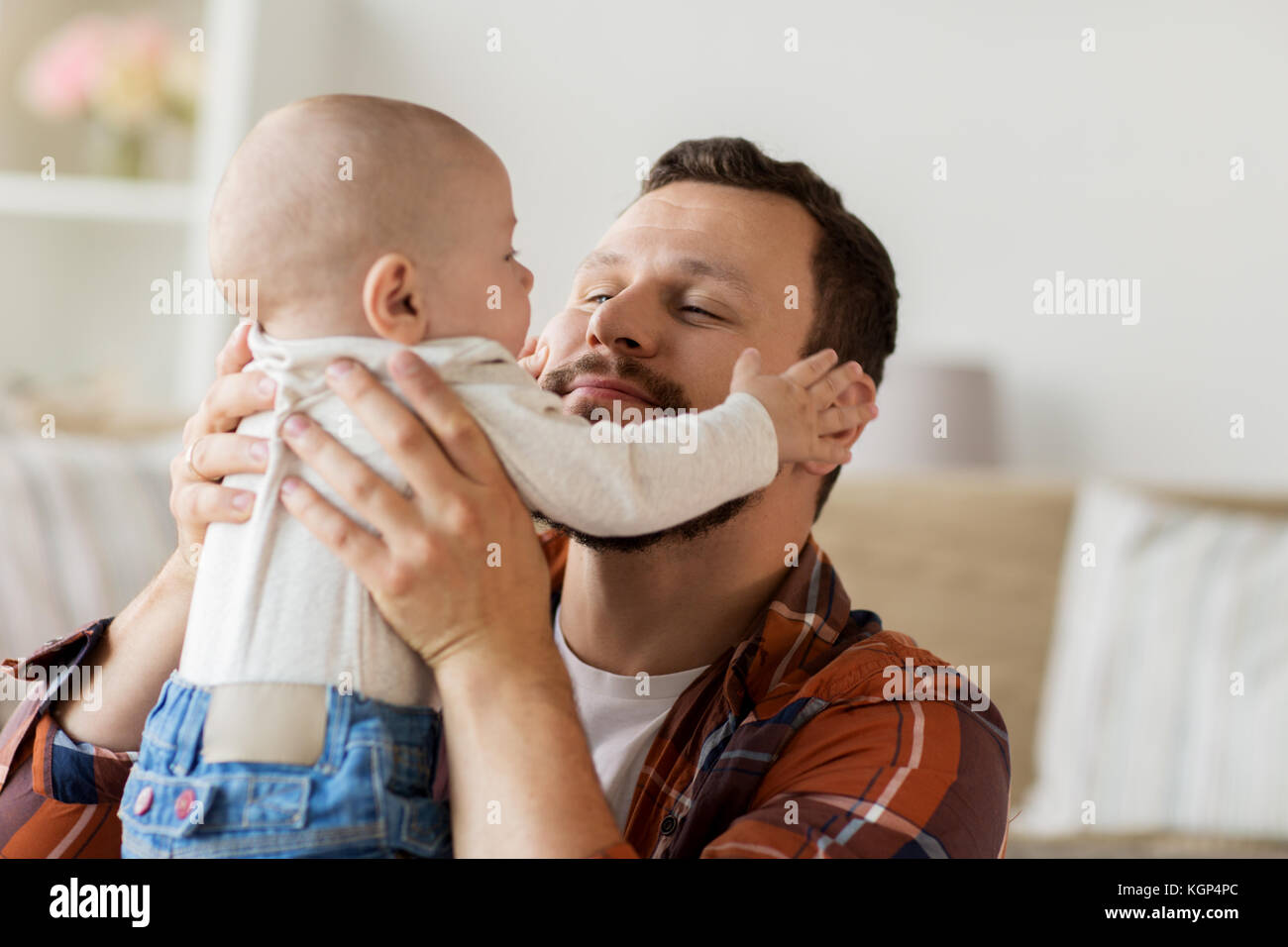 family, parenthood and people concept - happy father with little baby ...