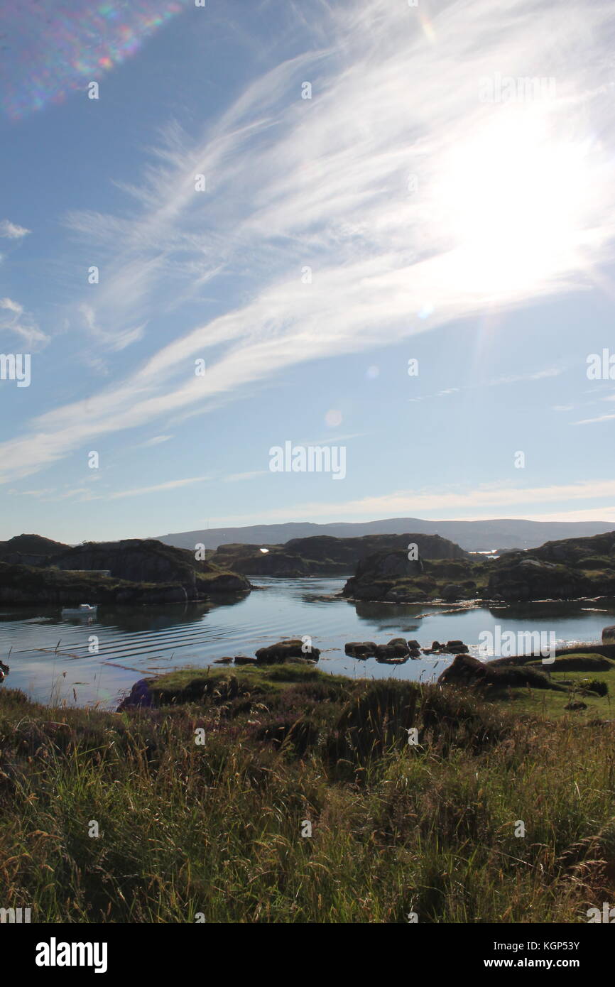 Clouds over the islands in the the Rosses Stock Photo - Alamy