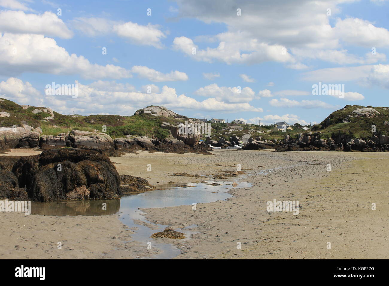 Tidal Rockpool with a view of the Islands in The Rosses, Donegal ...