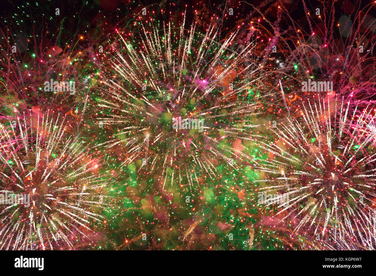 Colorful bright fireworks against dark sky Stock Photo - Alamy