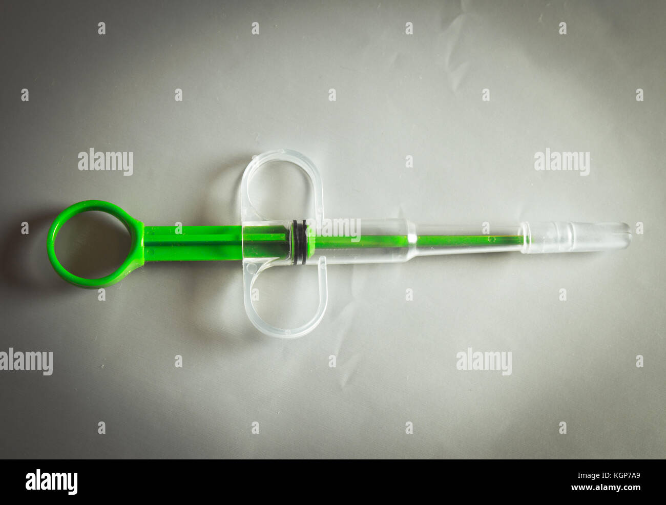 Special syringe to give medication of pills to pets Stock Photo - Alamy