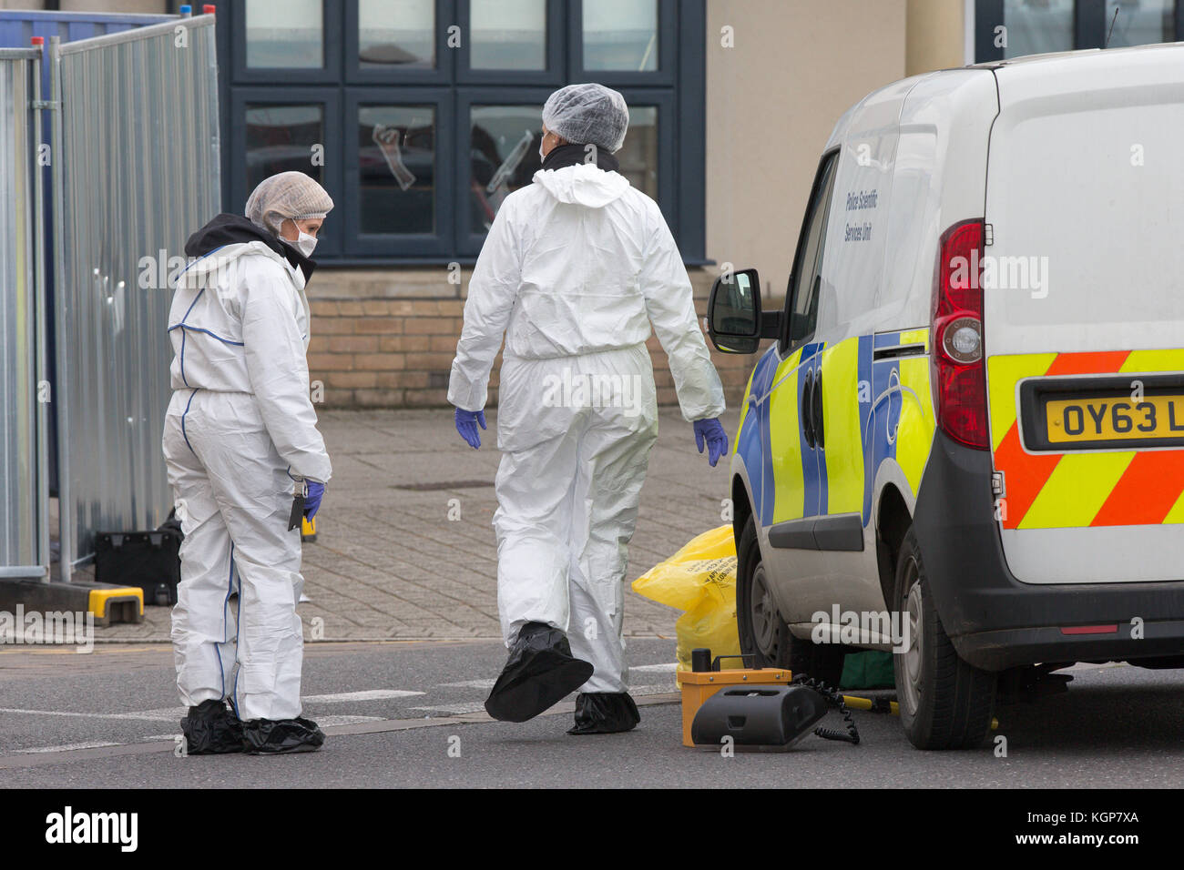 White forensic suit hi-res stock photography and images - Alamy