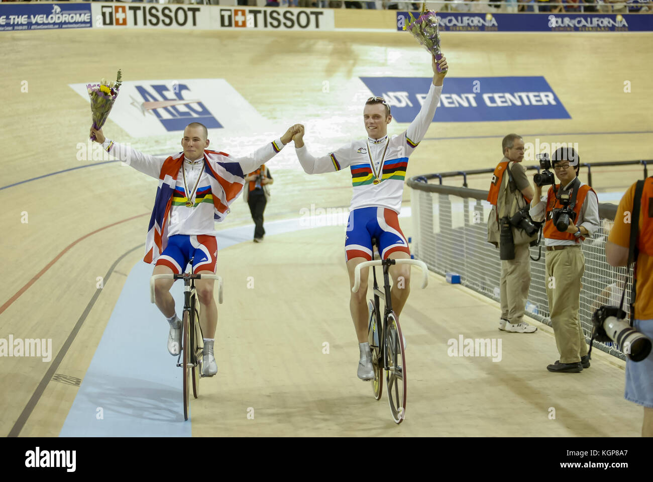 Mark Cavendish of Great Britain, left, and his teammate Robert Hayles ...