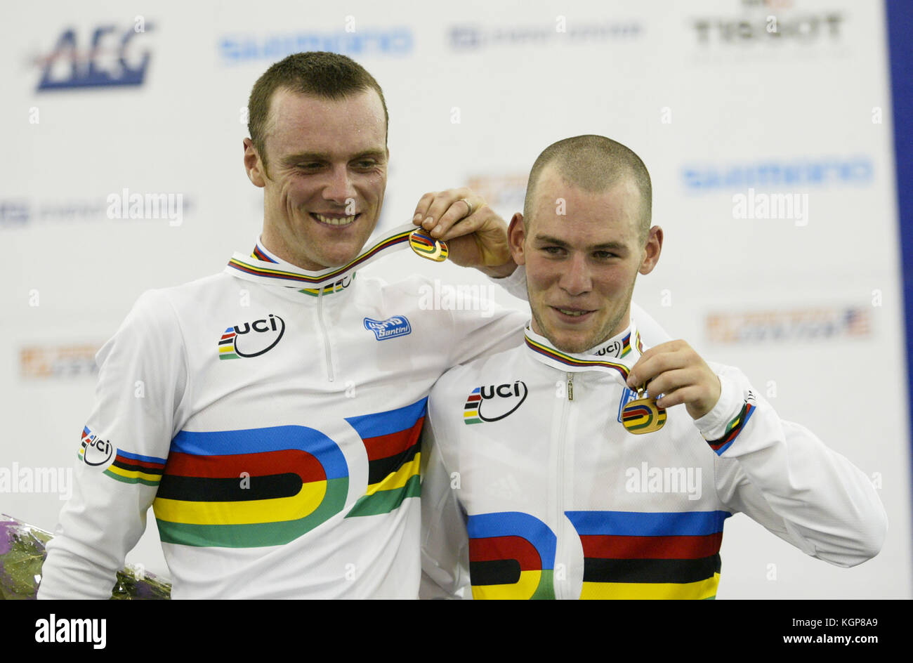 Mark Cavendish of Great Britain, right, and his teammate Robert Hayles ...