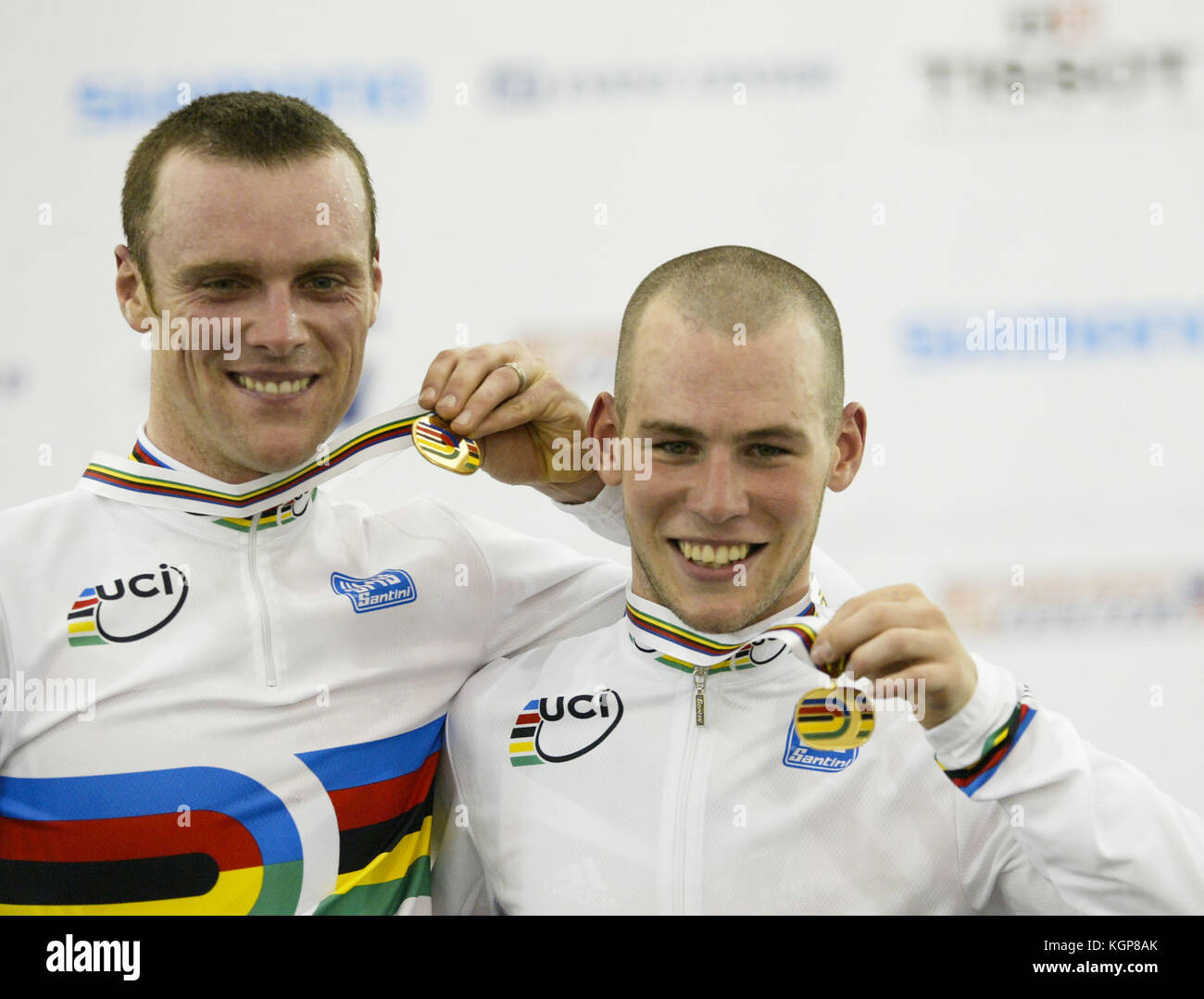 Mark Cavendish of Great Britain, right, and his teammate Robert Hayles ...