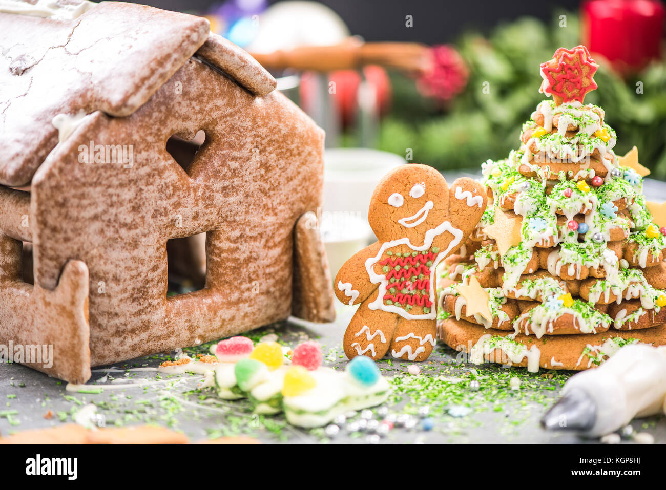 Making gingerbread house and sweet Christmas tree in creative artisan ...