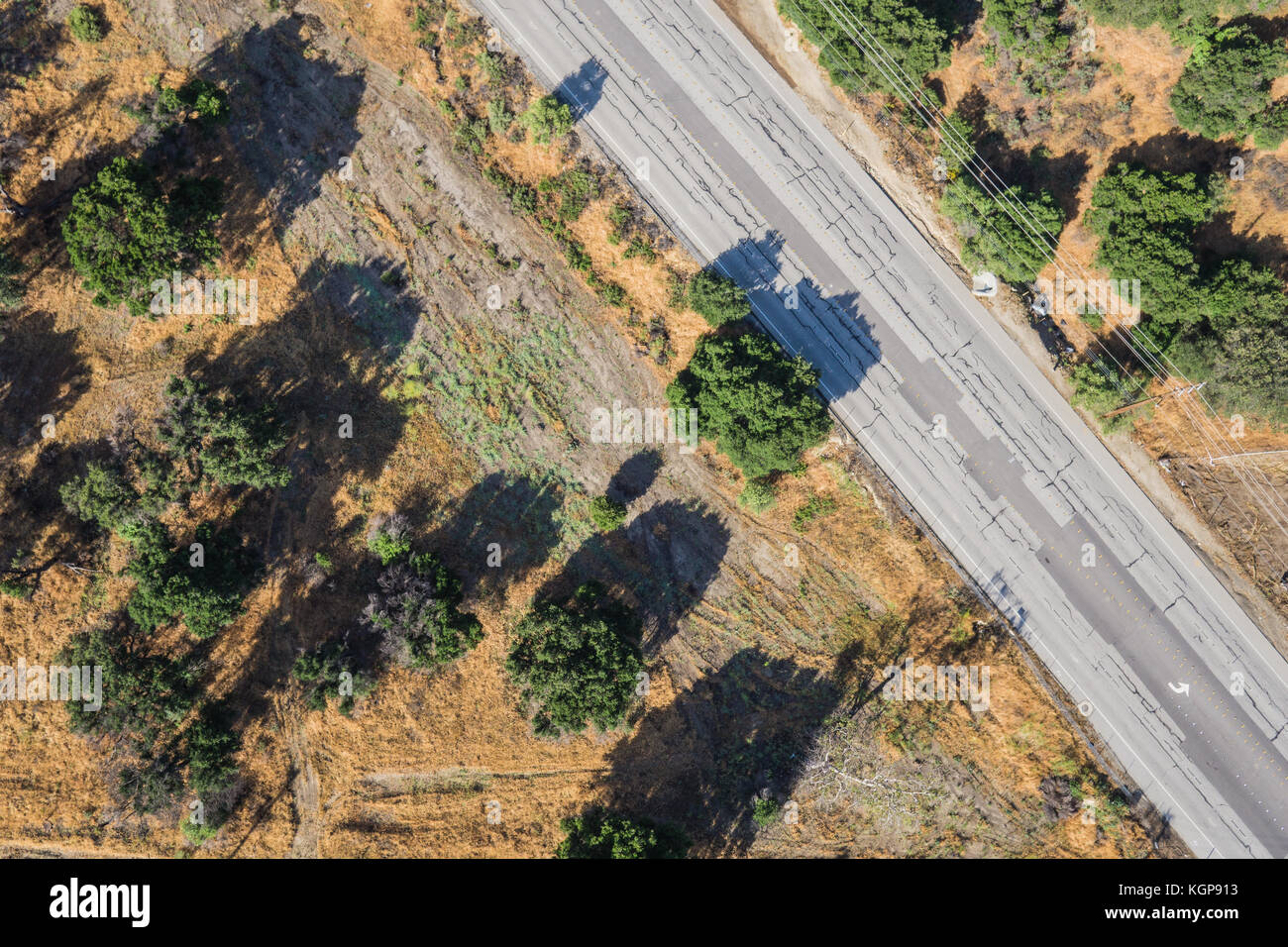 View of patched asphalt road from high above Stock Photo - Alamy