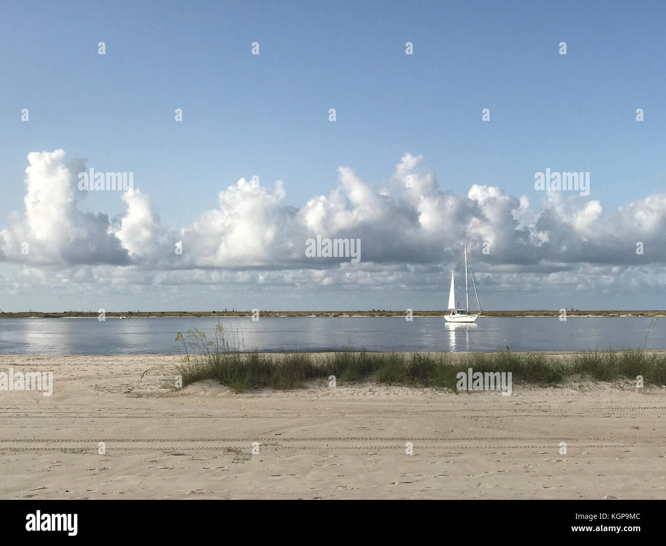 Sailboat in the Morning Sun Stock Photo - Alamy