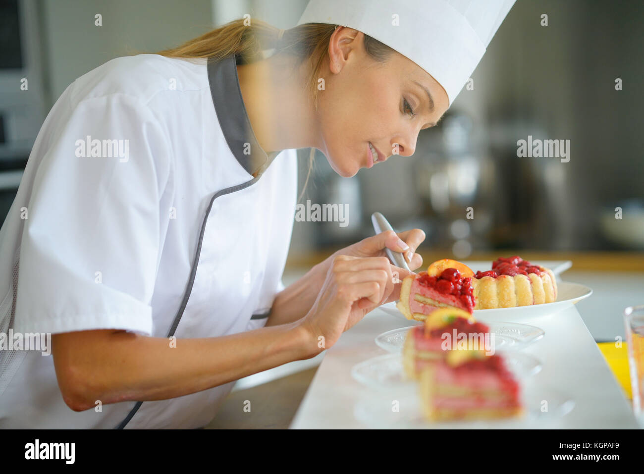 Chef woman portrait cutting hi-res stock photography and images - Alamy