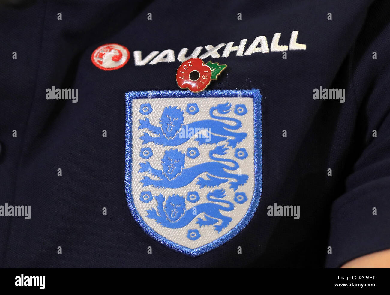A general view of a poppy badge and England crest during the press ...
