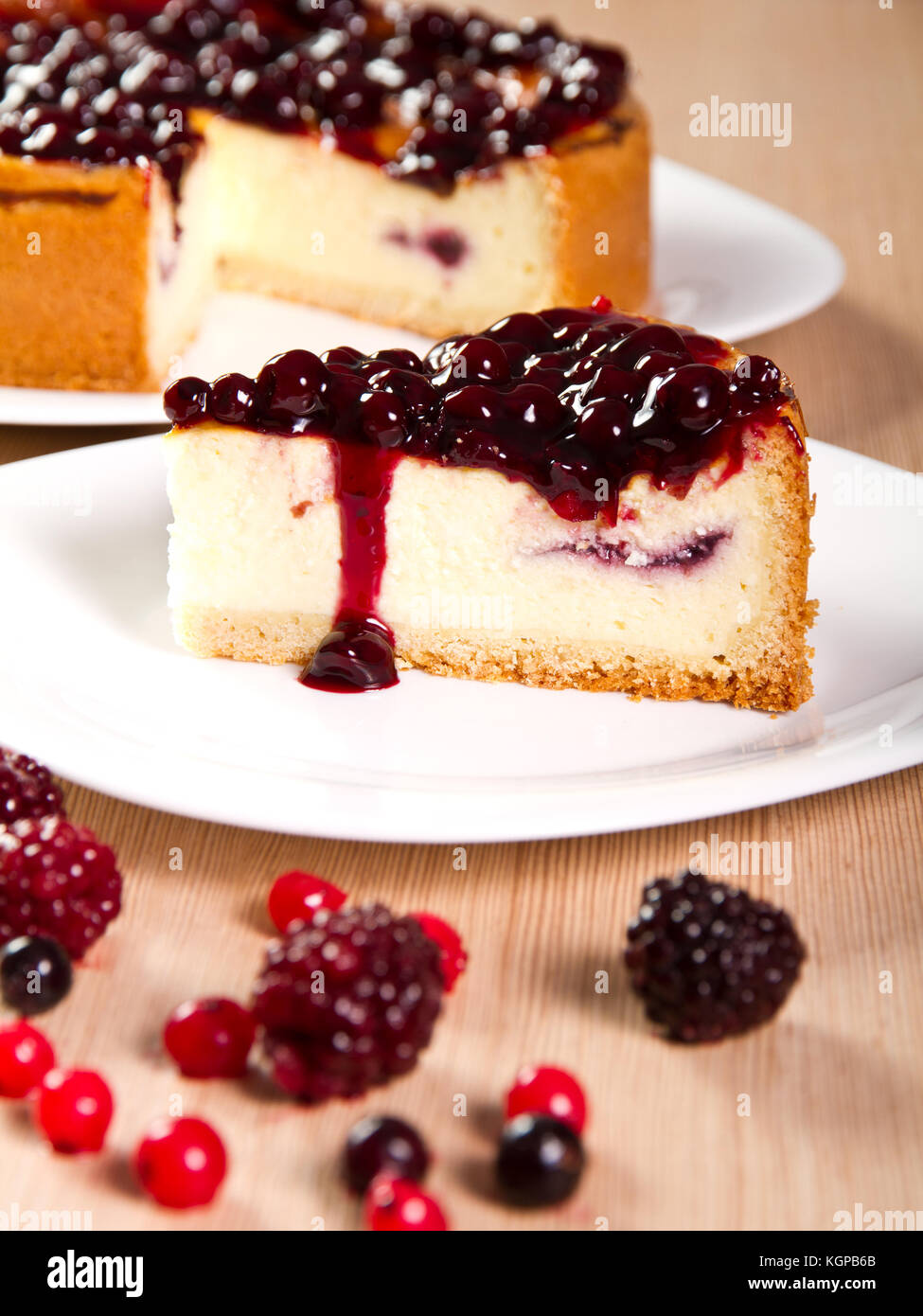Cheese cake with cherry jam Stock Photo - Alamy