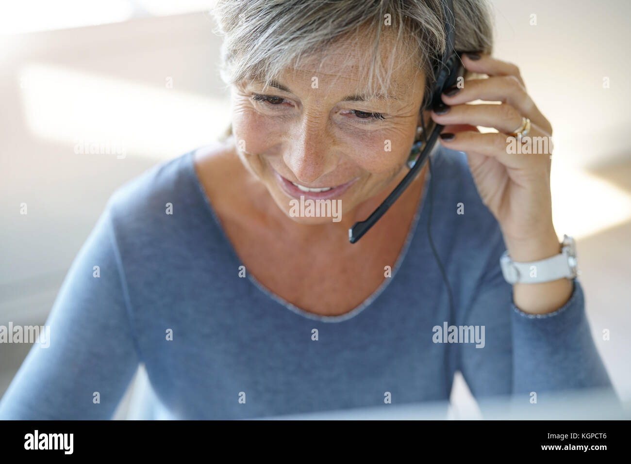 Senior sales representative working in office Stock Photo - Alamy
