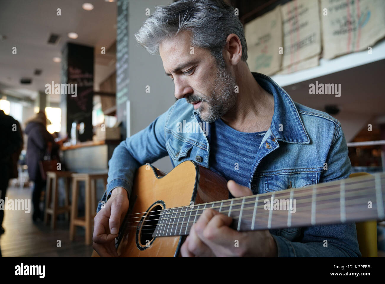 Guitar playing bar hi-res stock photography and images - Alamy