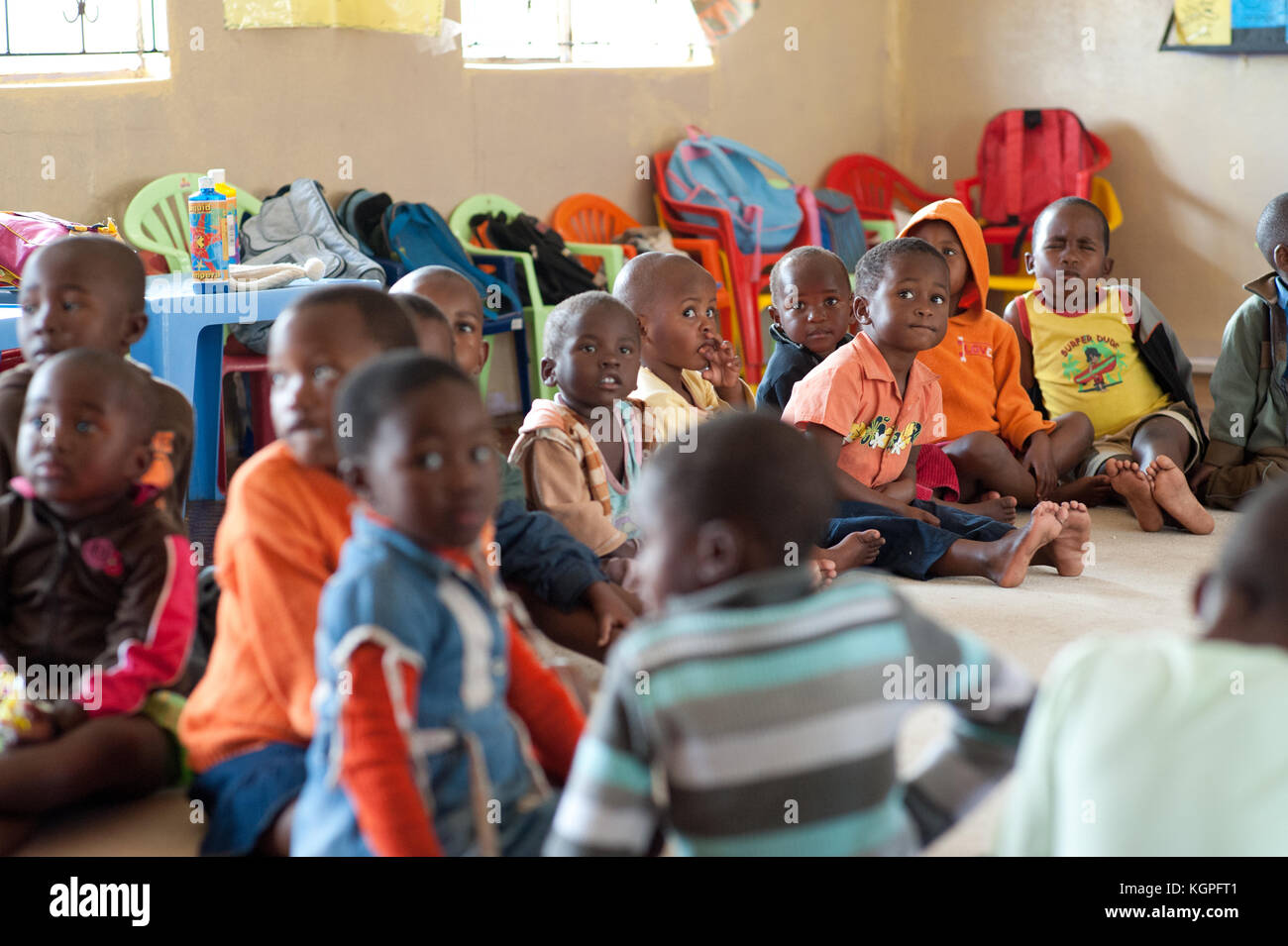 Group of black african children at school. Elementary classroom near ...