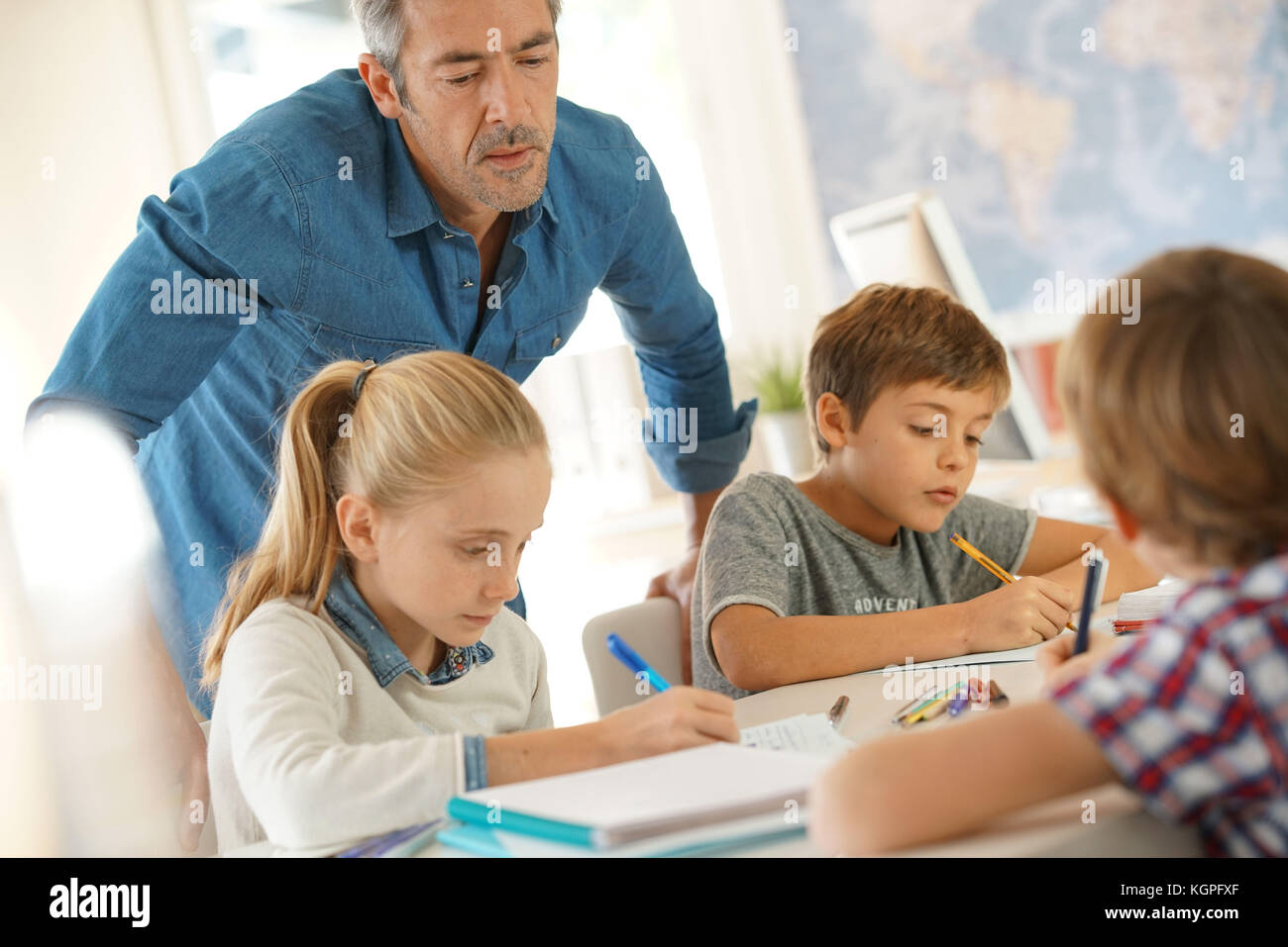 Lesson school teacher taking notes hi-res stock photography and images ...