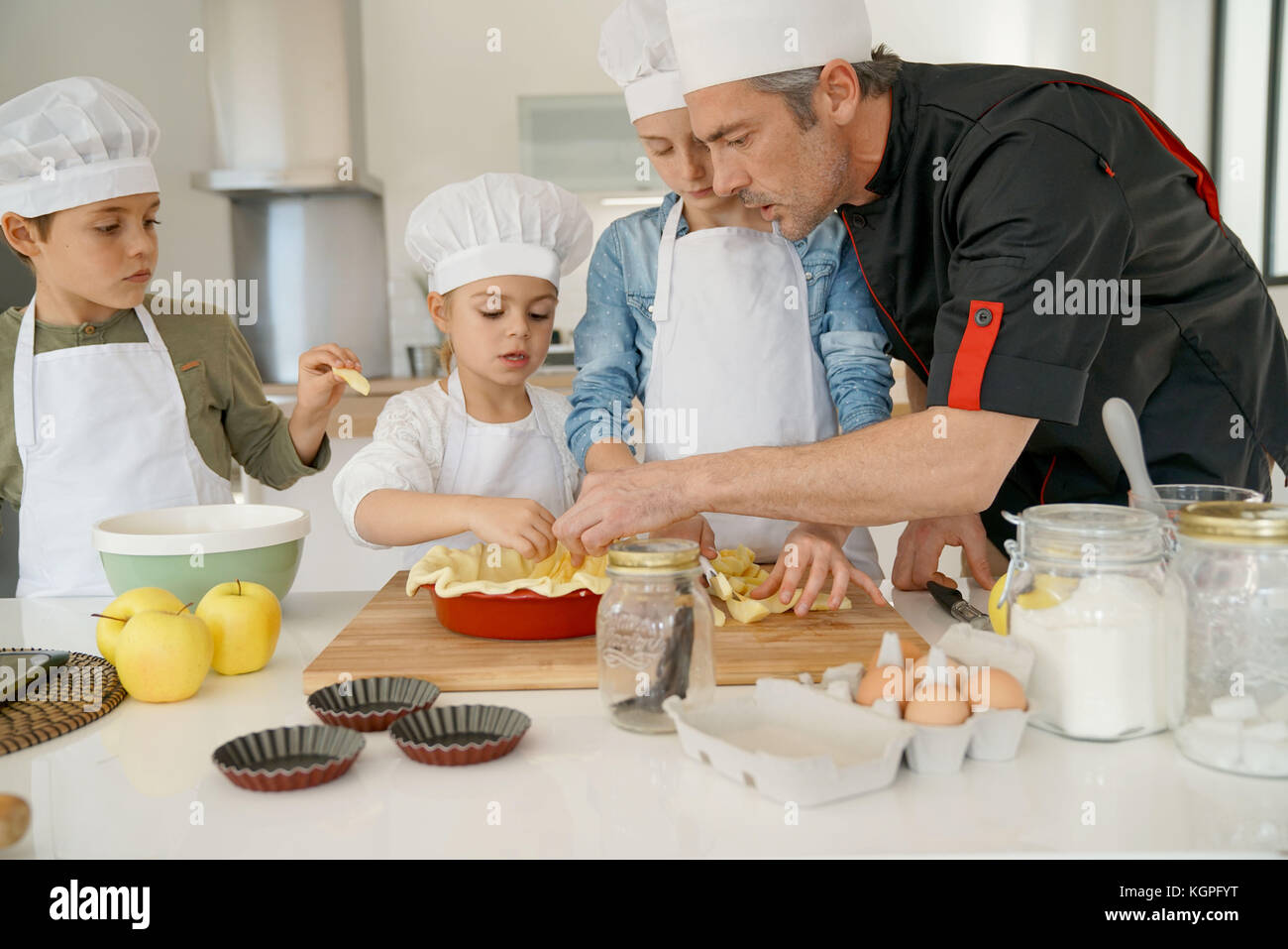 Pastry class with kids little chefs Stock Photo - Alamy