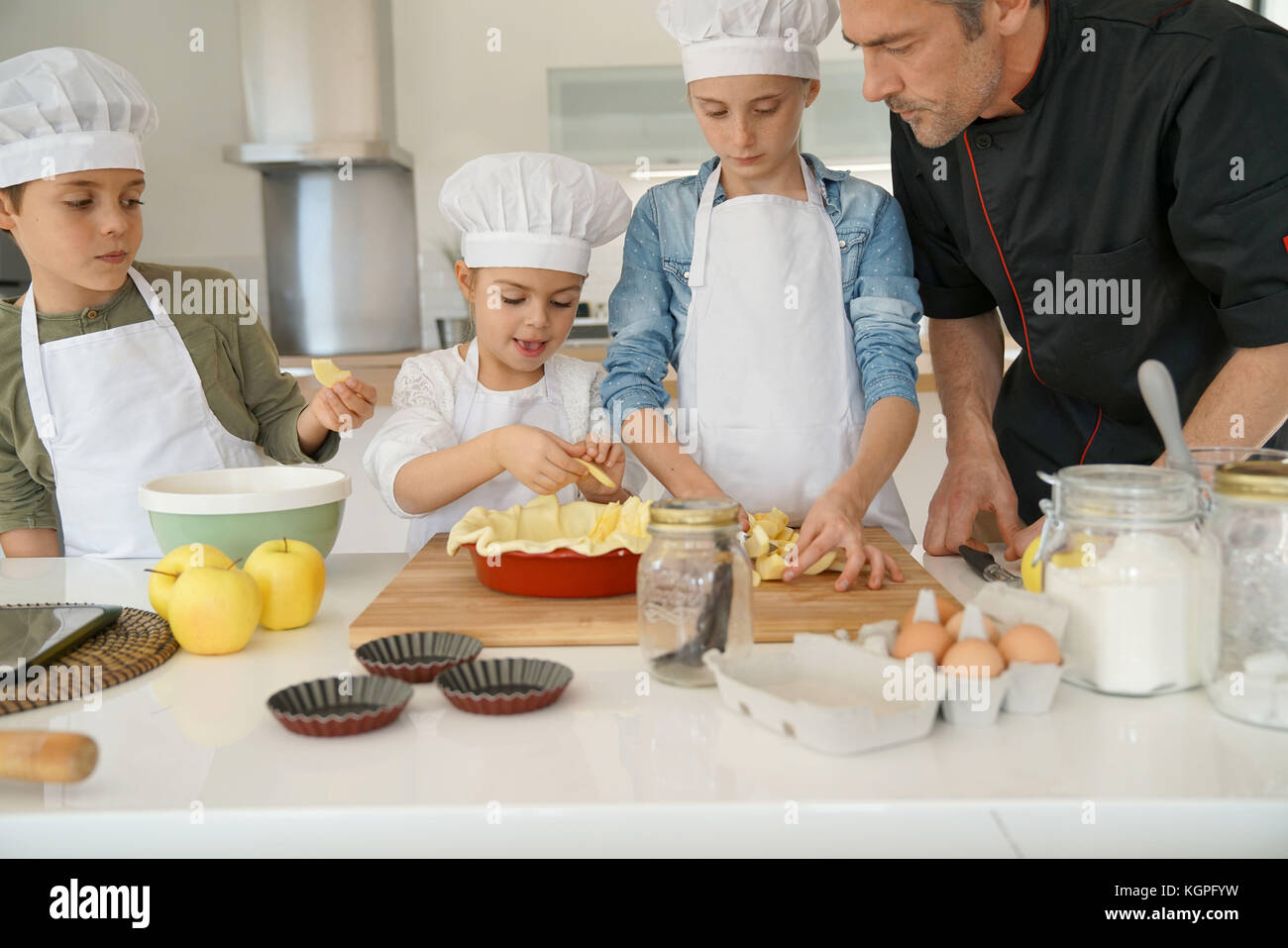 Pastry class with kids little chefs Stock Photo - Alamy