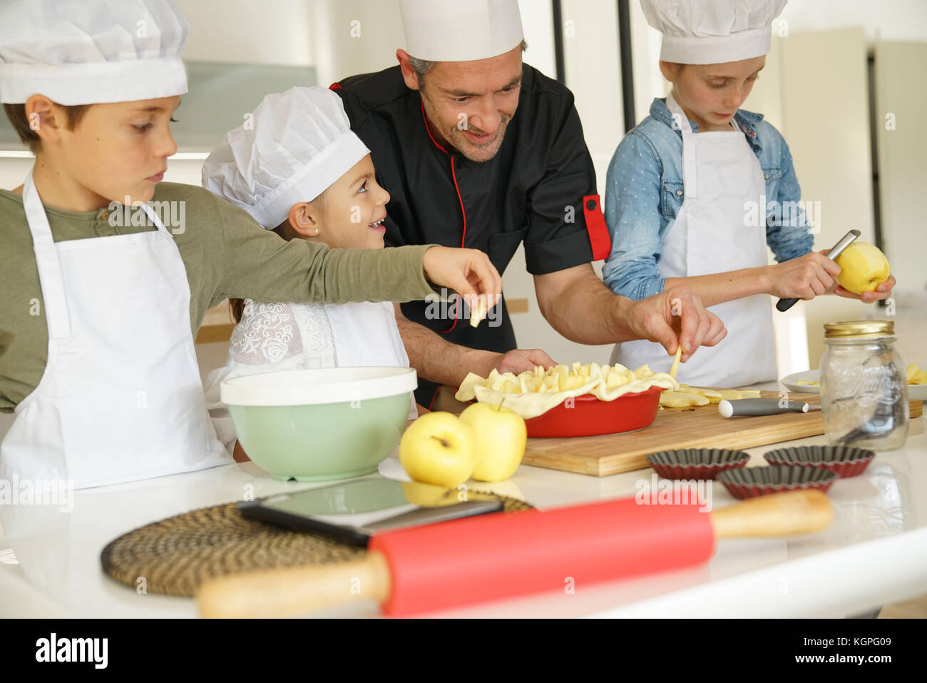 Pastry class with kids little chefs Stock Photo - Alamy