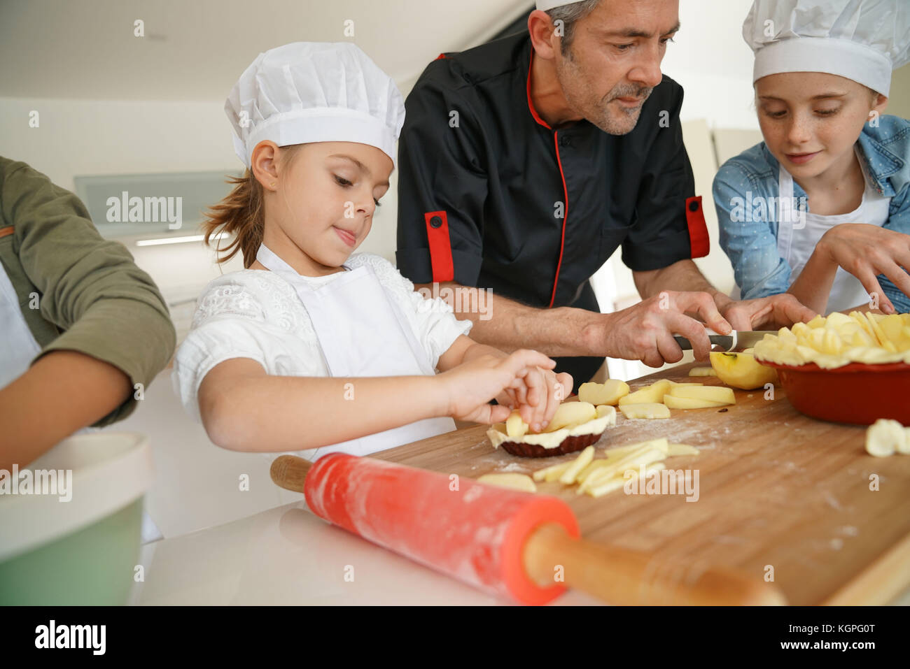Pastry class with kids little chefs Stock Photo - Alamy