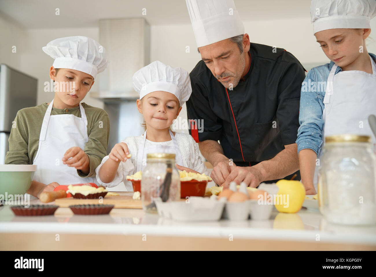 Pastry class with kids little chefs Stock Photo - Alamy
