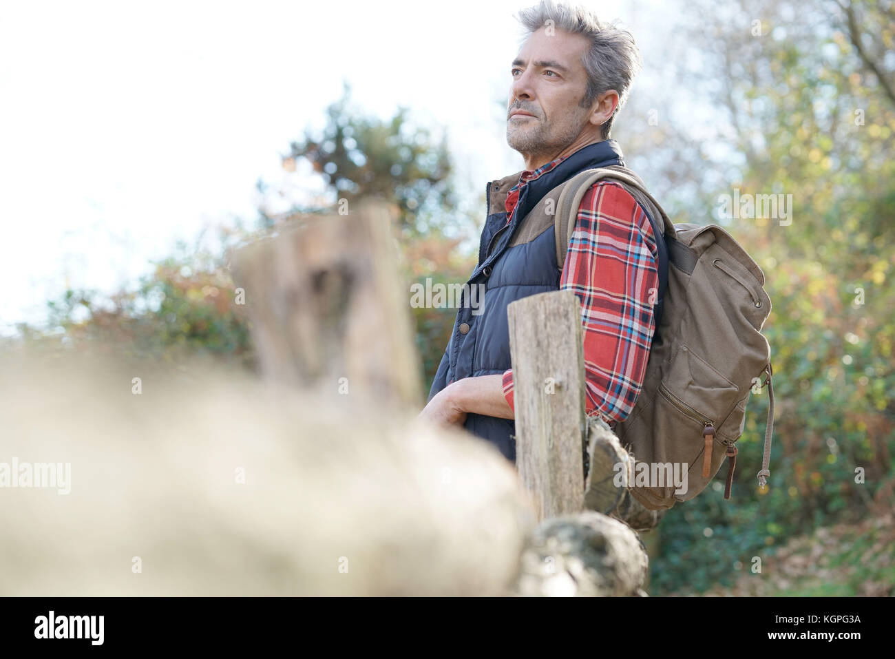Man leaning on country fence hi-res stock photography and images - Alamy
