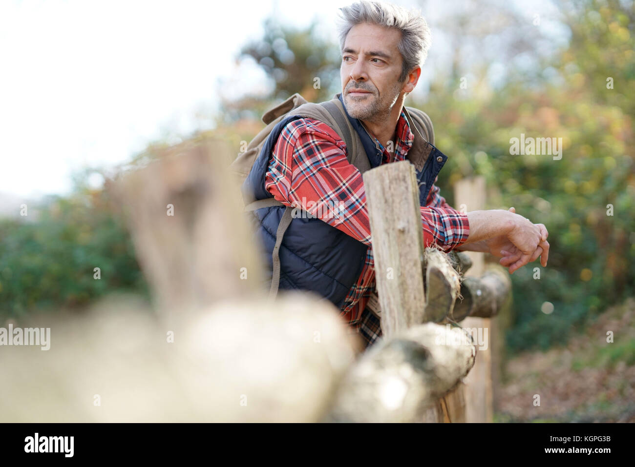 Man leaning on country fence hi-res stock photography and images - Alamy