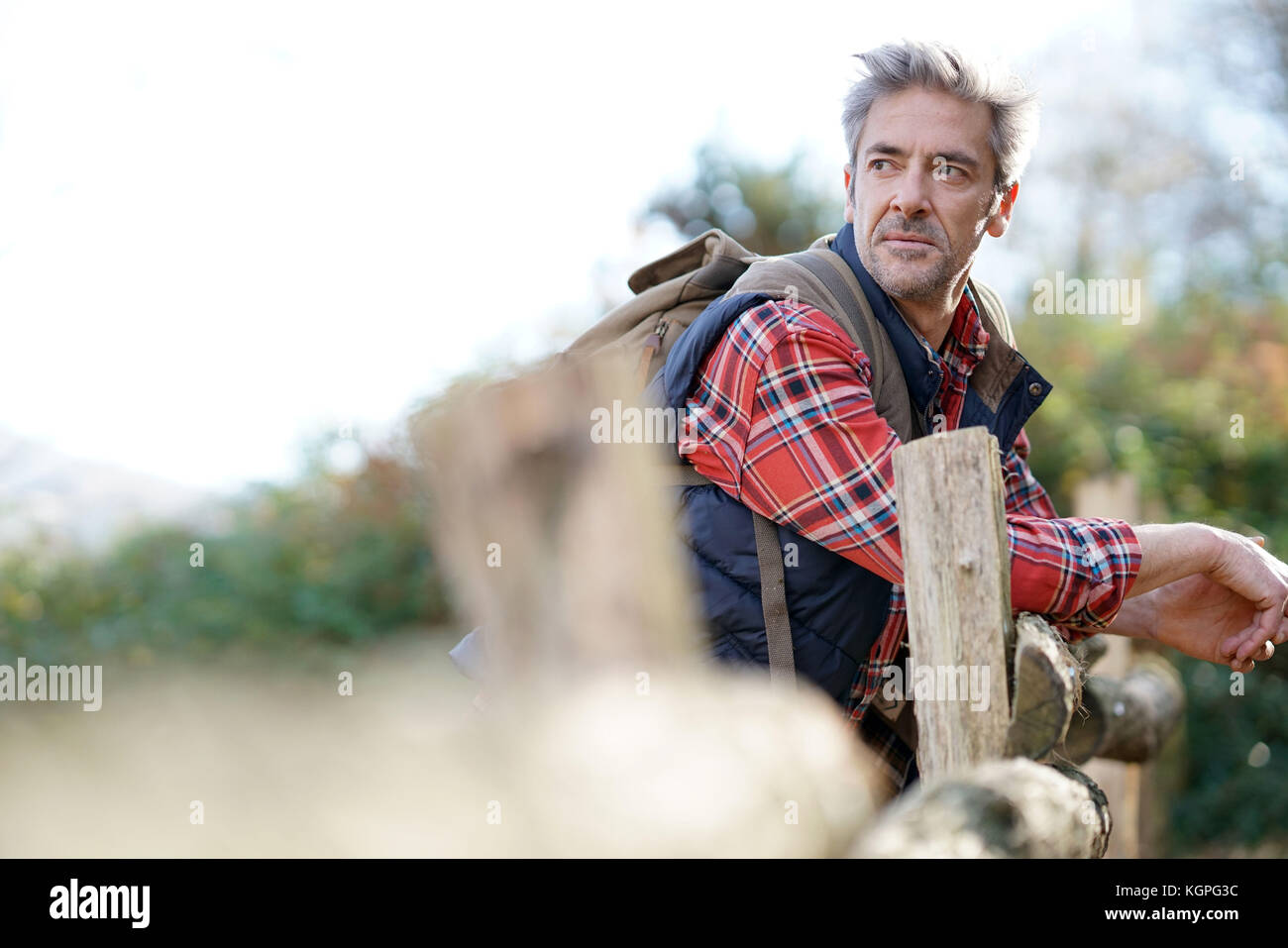 Man leaning on country fence hi-res stock photography and images - Alamy