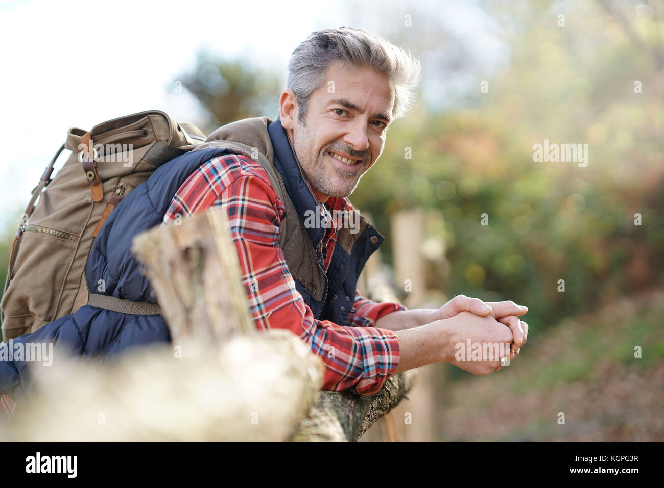 Man leaning on country fence hi-res stock photography and images - Alamy