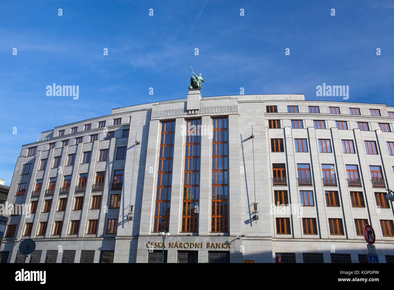 Prague, Czech Republic - May 10, 2017: Statue on roof of entrance to ...