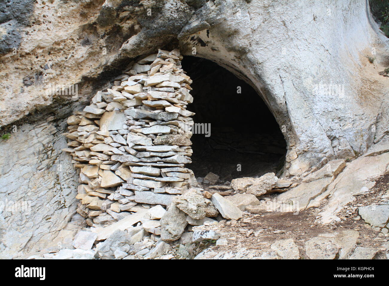 Stone shelter in a cave, made by a cavemen Stock Photo - Alamy