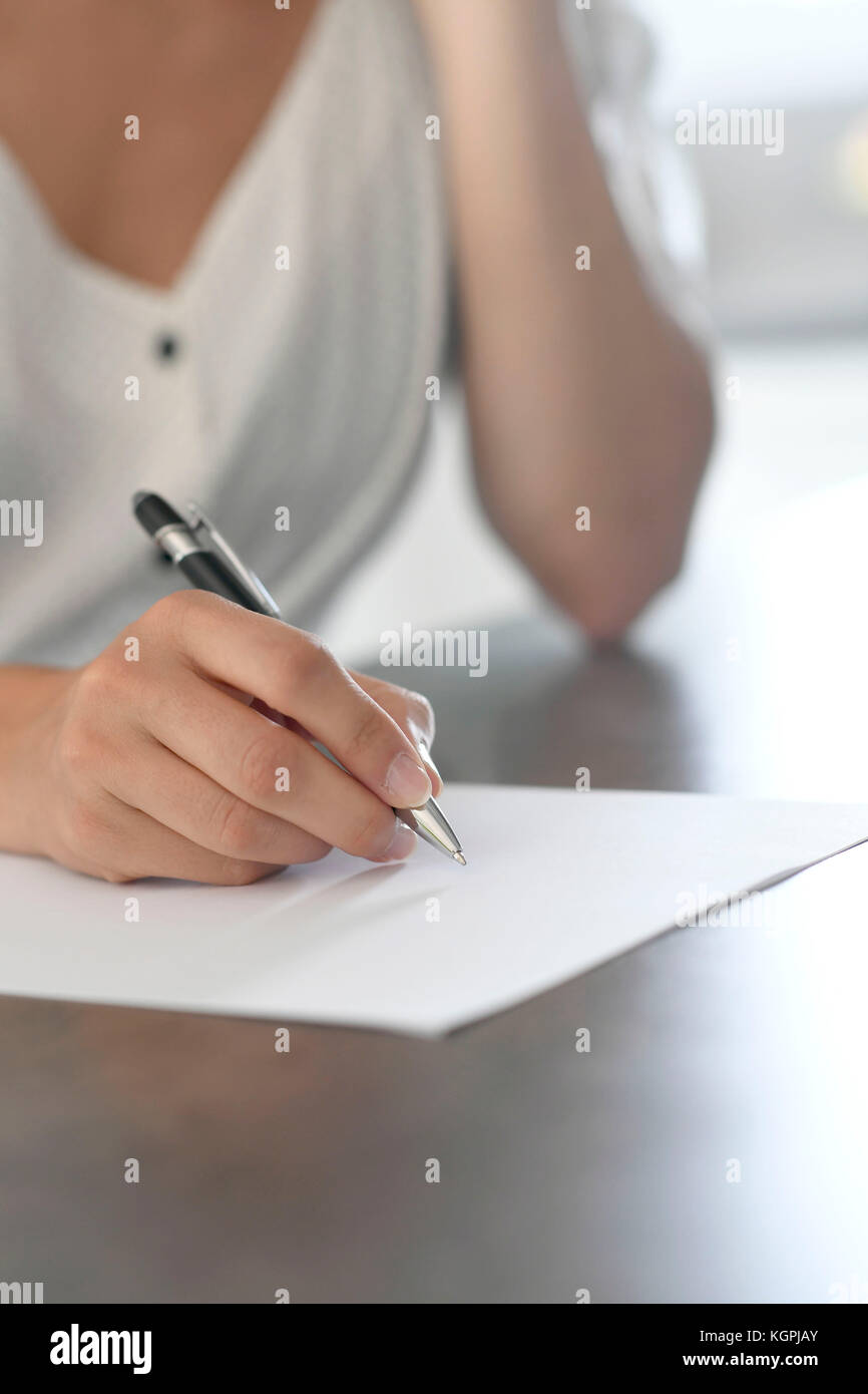 Woman writing letter hi-res stock photography and images - Alamy