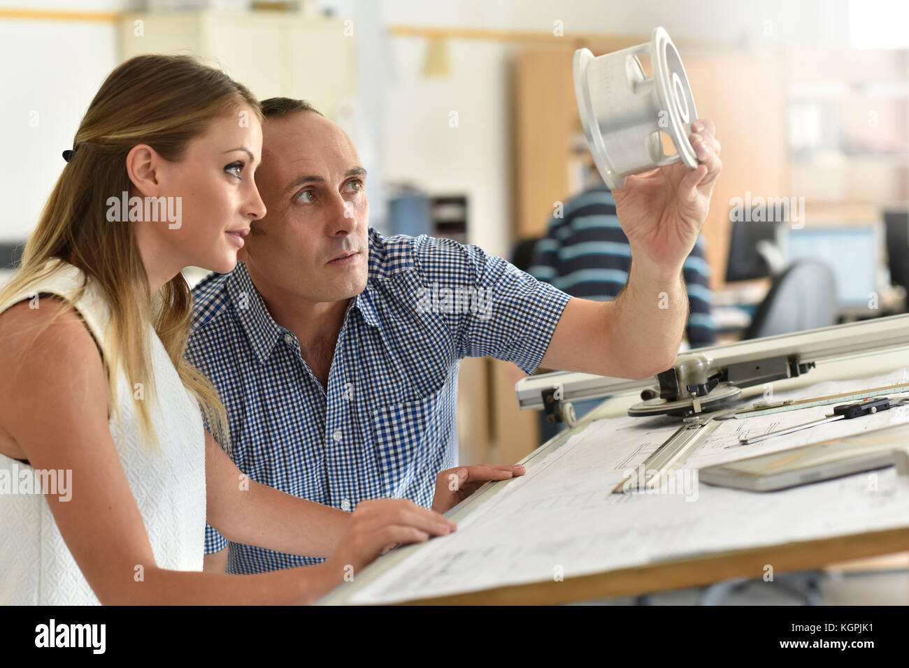 Young woman in engineering training class Stock Photo - Alamy
