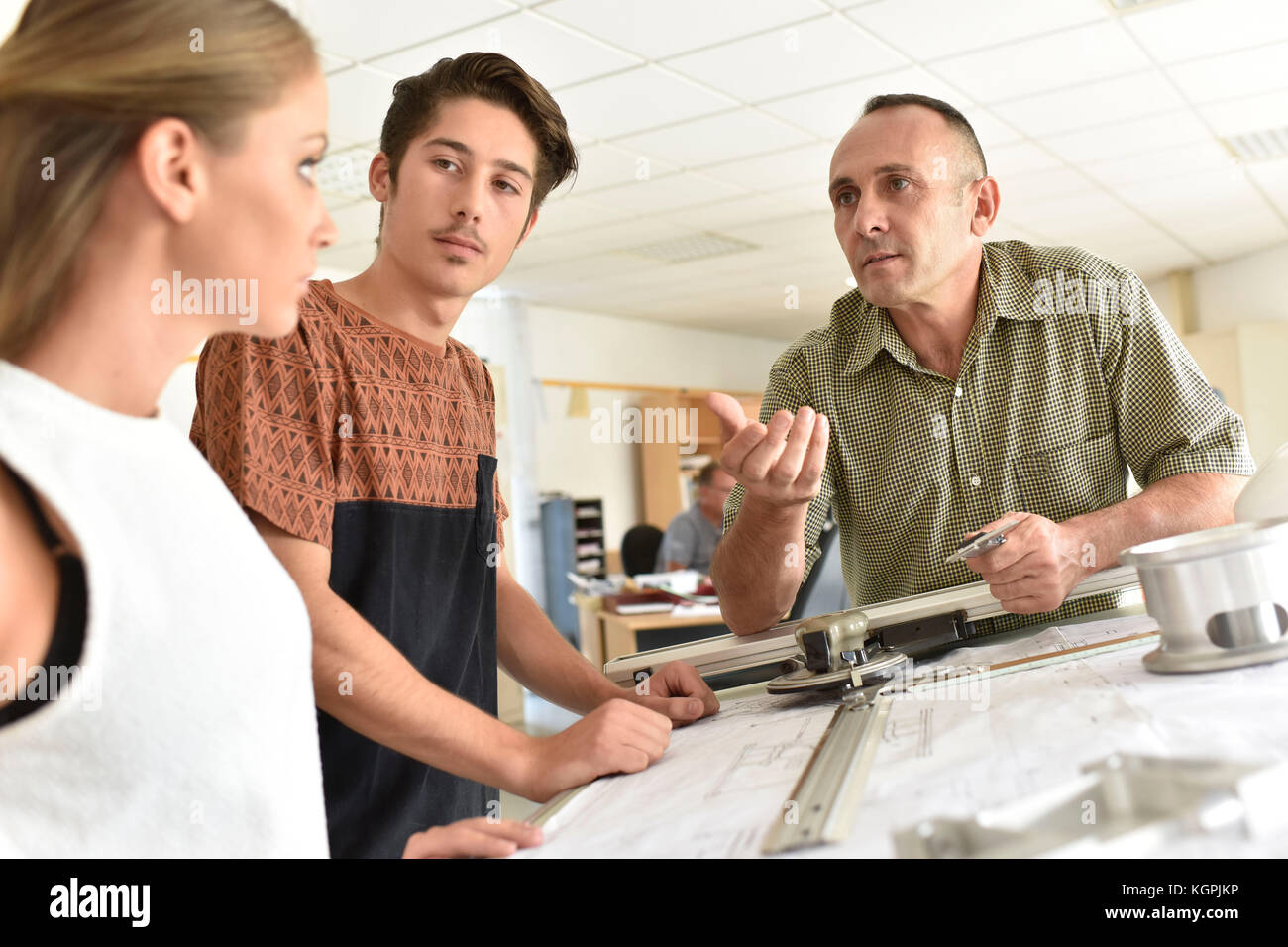 Young people in engineering training class Stock Photo - Alamy