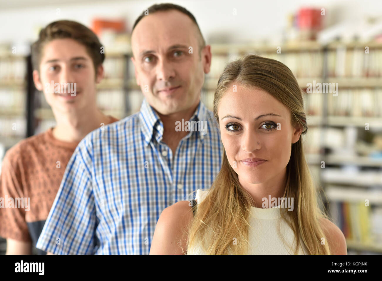 Portrait of teacher with students in designer's office Stock Photo - Alamy