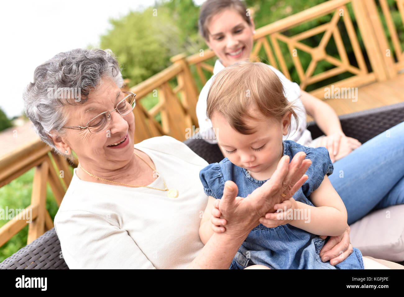 Family visiting elderly people hi-res stock photography and images - Alamy