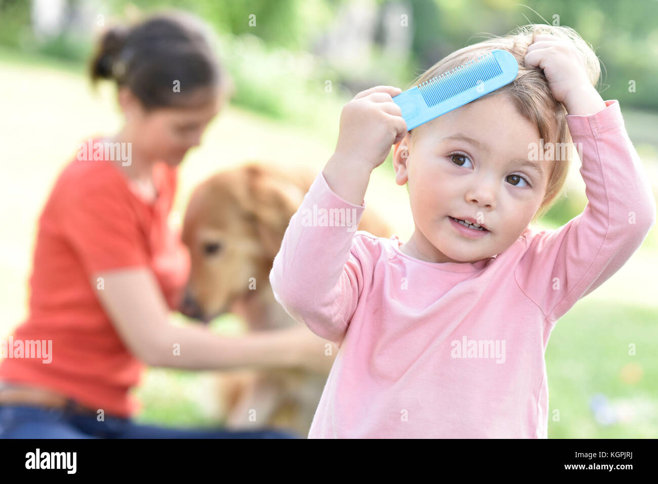 Child comb hair hi-res stock photography and images - Alamy