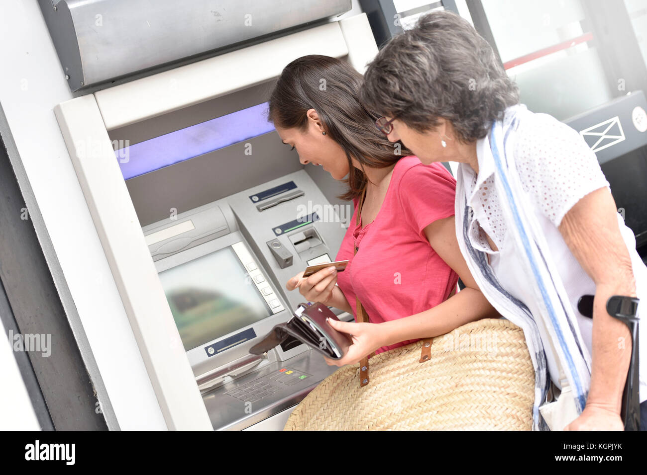 Withdrawing Cash From Atm High Resolution Stock Photography and Images ...